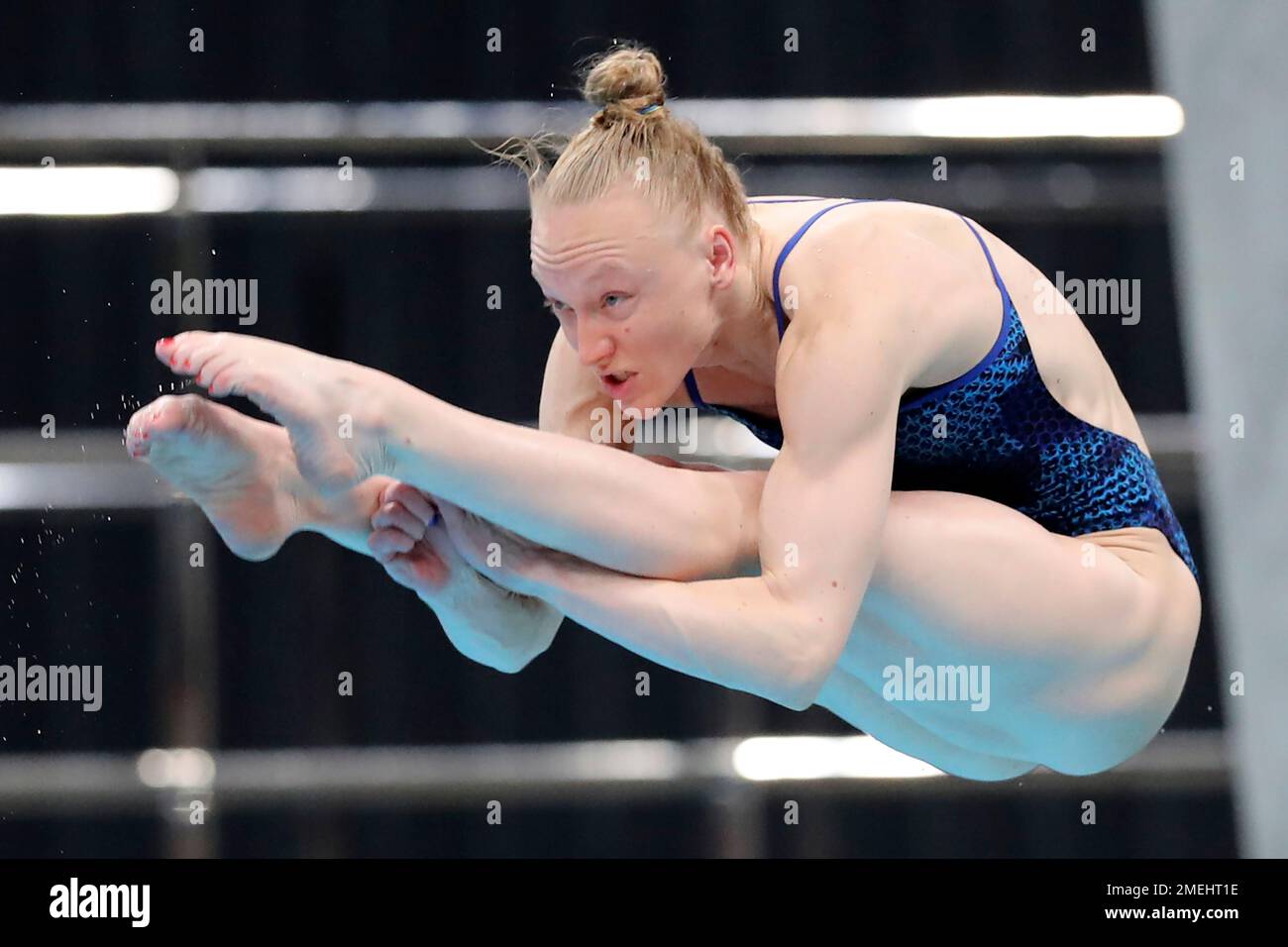 Bacon Sarah of the United States performs a dive during the women's 3 ...