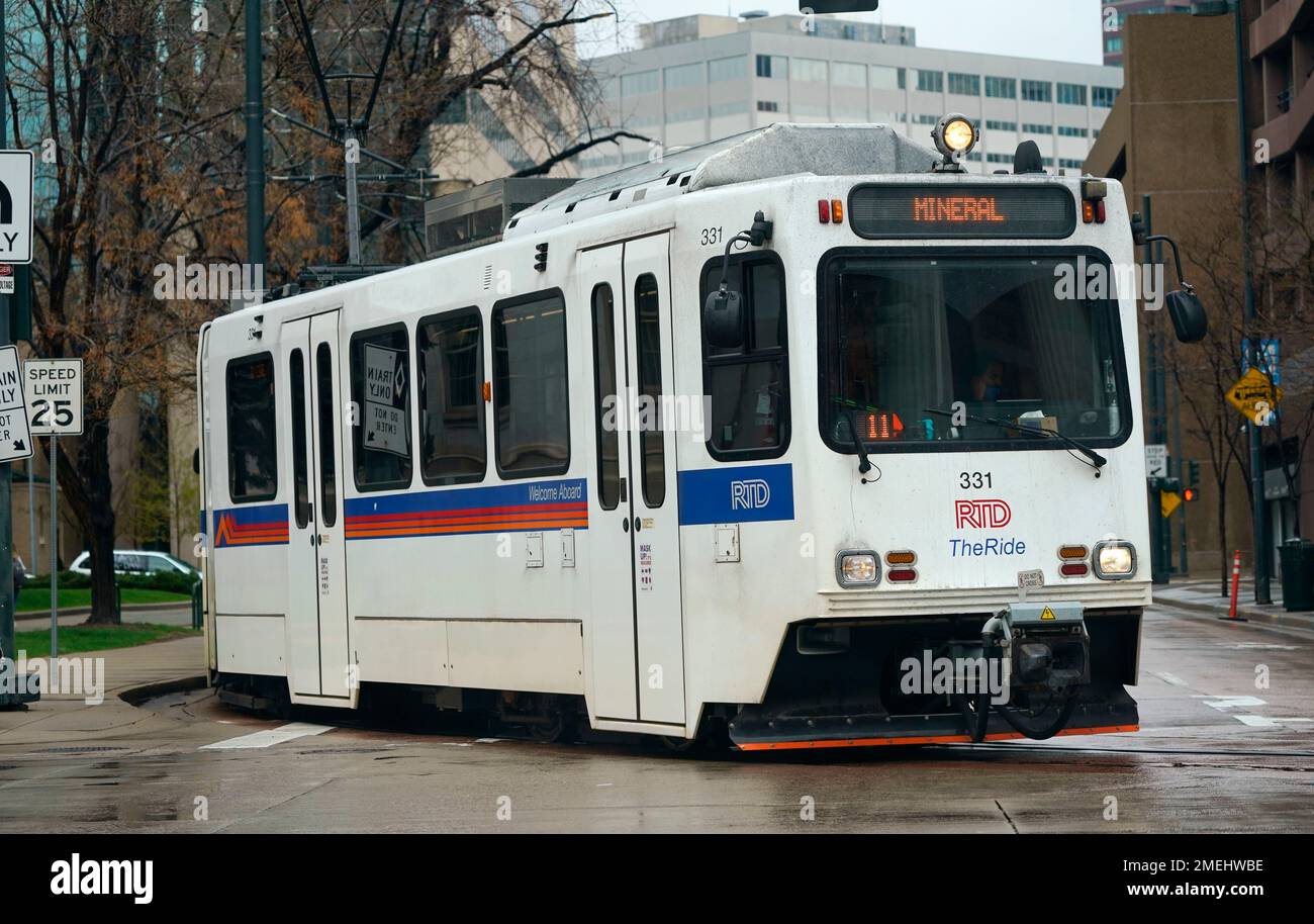 A Regional Transportation Authority light rail train snakes across 19th ...