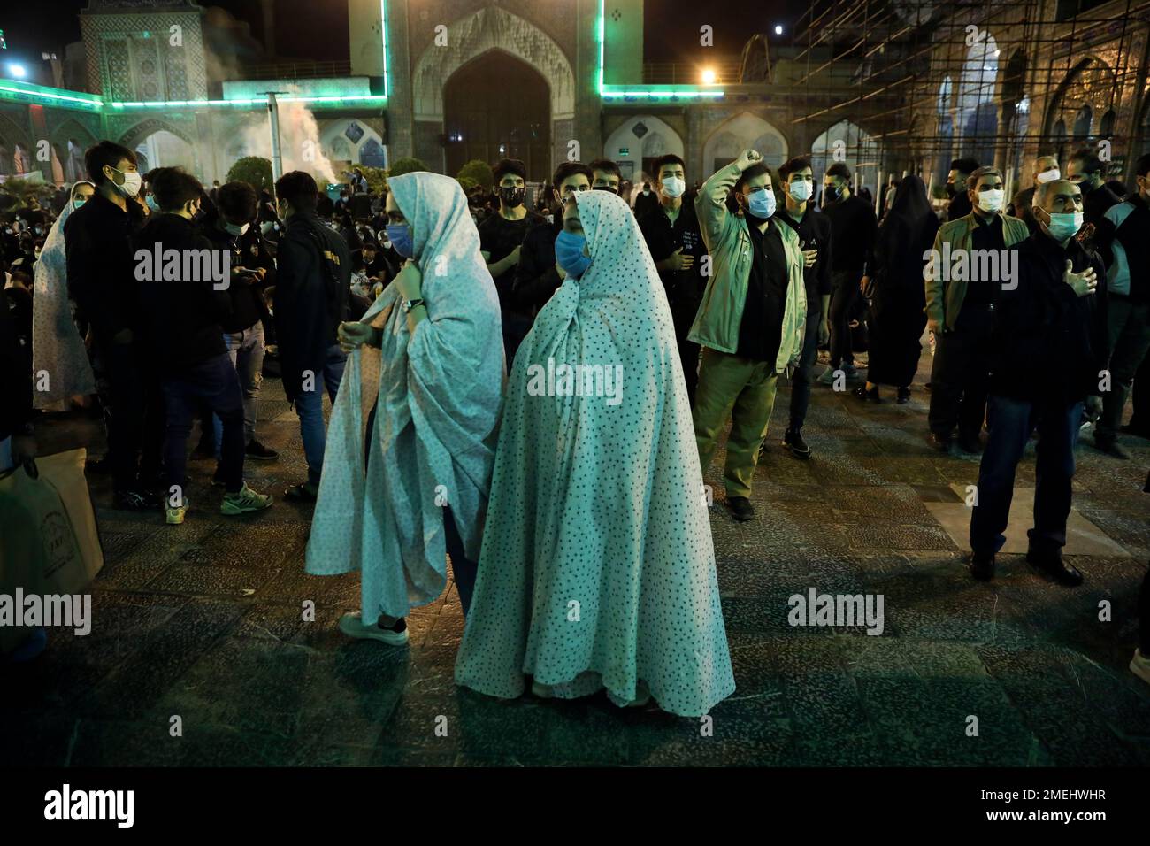 Worshippers attend a ceremony at the Laylat al-Qadr, or the night of ...