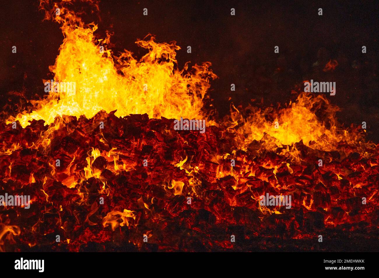 Fire by night. Flames and embers. Hell and inferno Stock Photo - Alamy