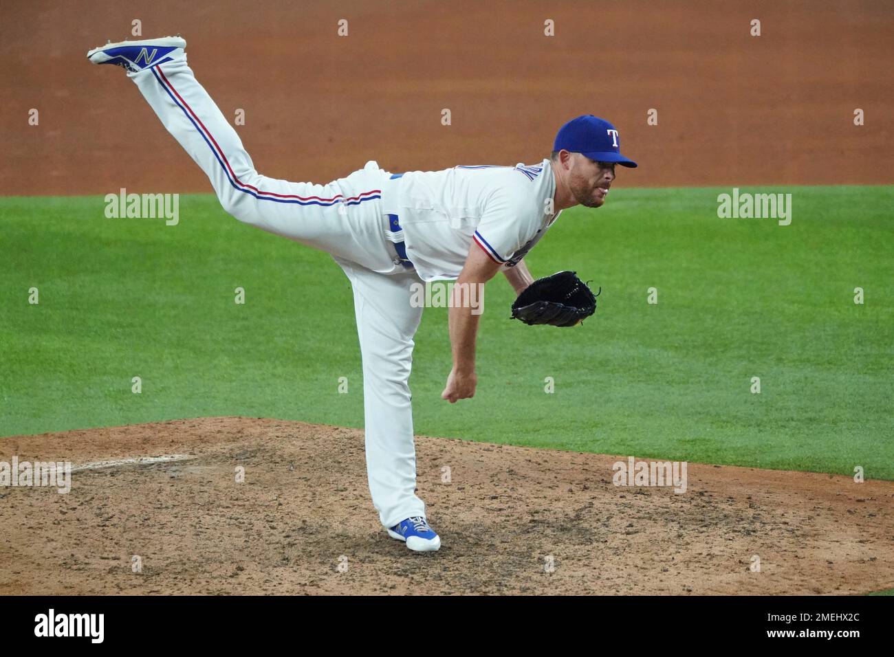 Texas Rangers relief pitcher Ian Kennedy throws against the Boston Red ...