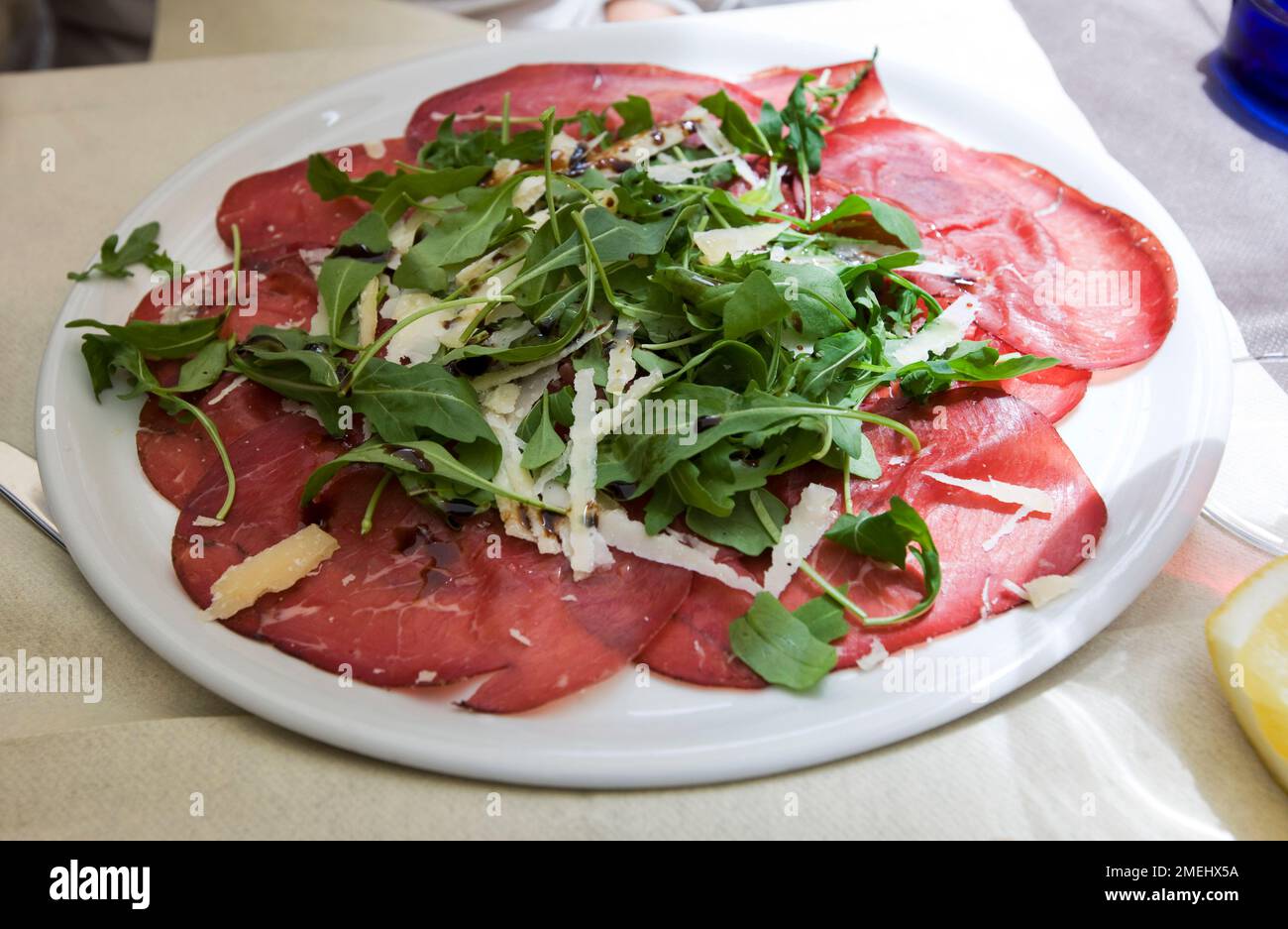 Light lunch Culatello ham parmesan cheese and ruccola salad, in Parma ...