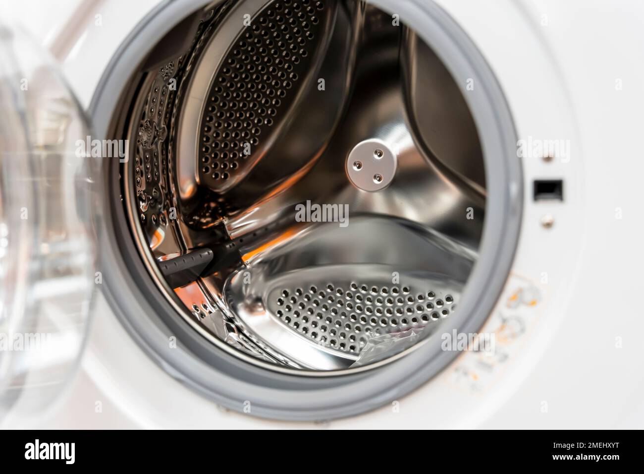 close-up of the metal drum of a modern washing machine Stock Photo - Alamy