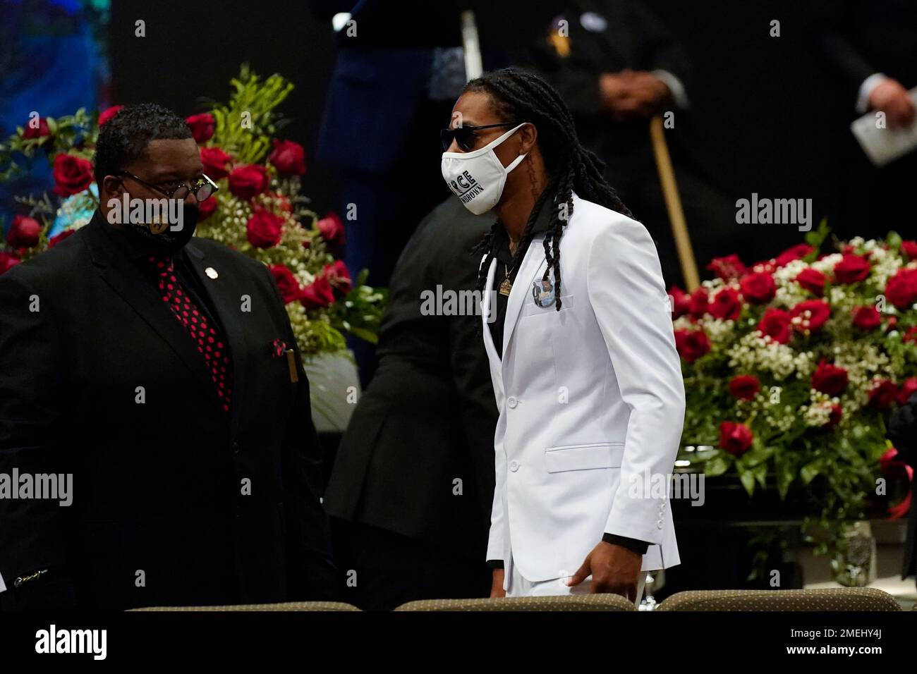 Andrew Brown Jr.'s son Khalil Ferebee, center, attends his father's ...