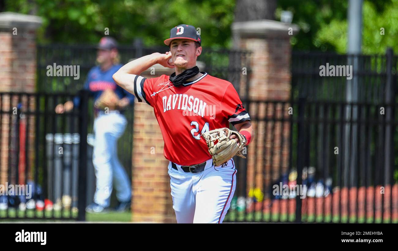 Davidson's Jake Wilhoit throws to first base during an NCAA baseball ...