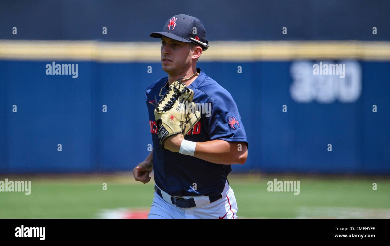 Richmond's Johnny Hipsman jogs off the field during an NCAA baseball ...