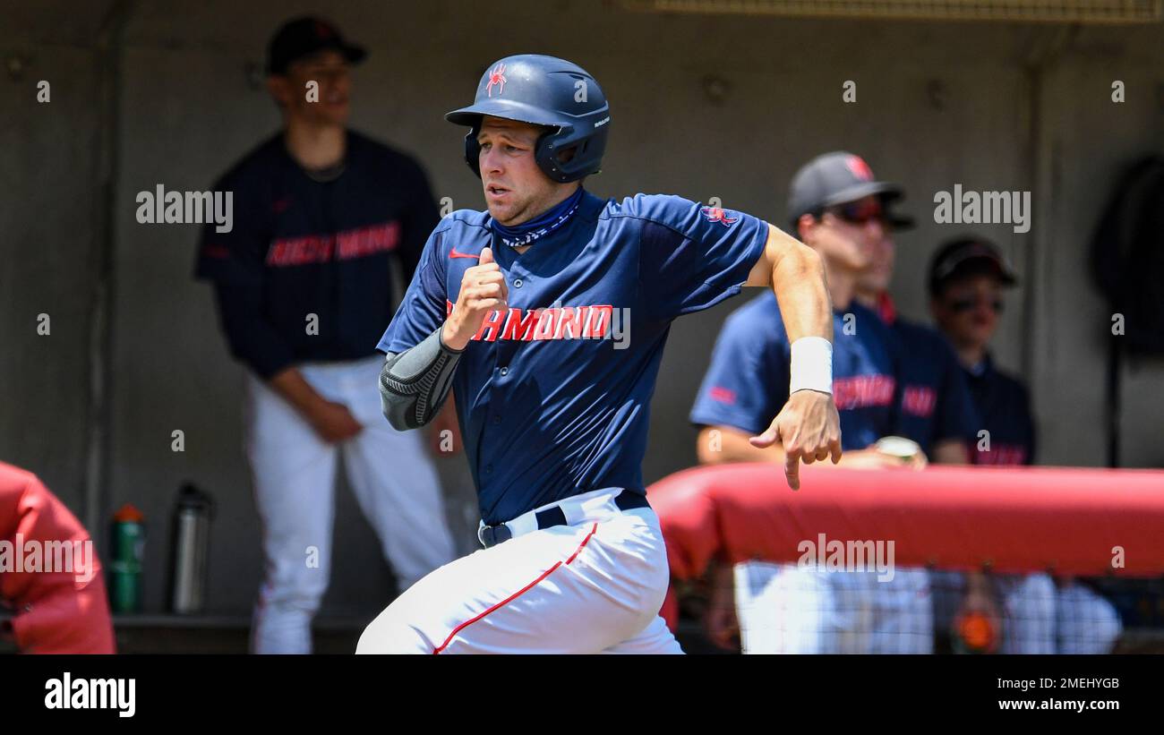 Richmond's Drew Blakely runs towards home plate during an NCAA baseball ...