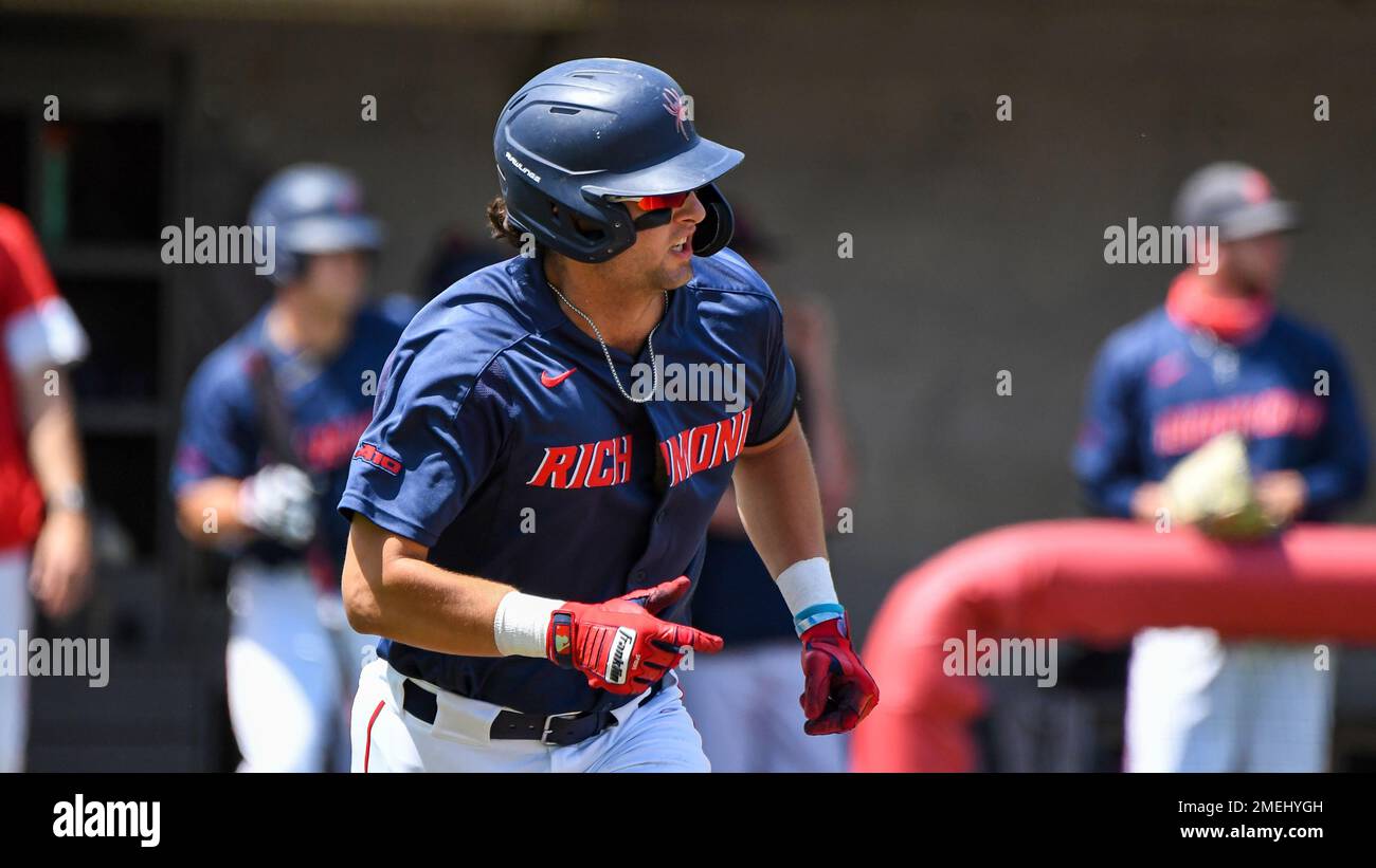 Richmond's Dominic Toso runs to first base during an NCAA baseball game ...