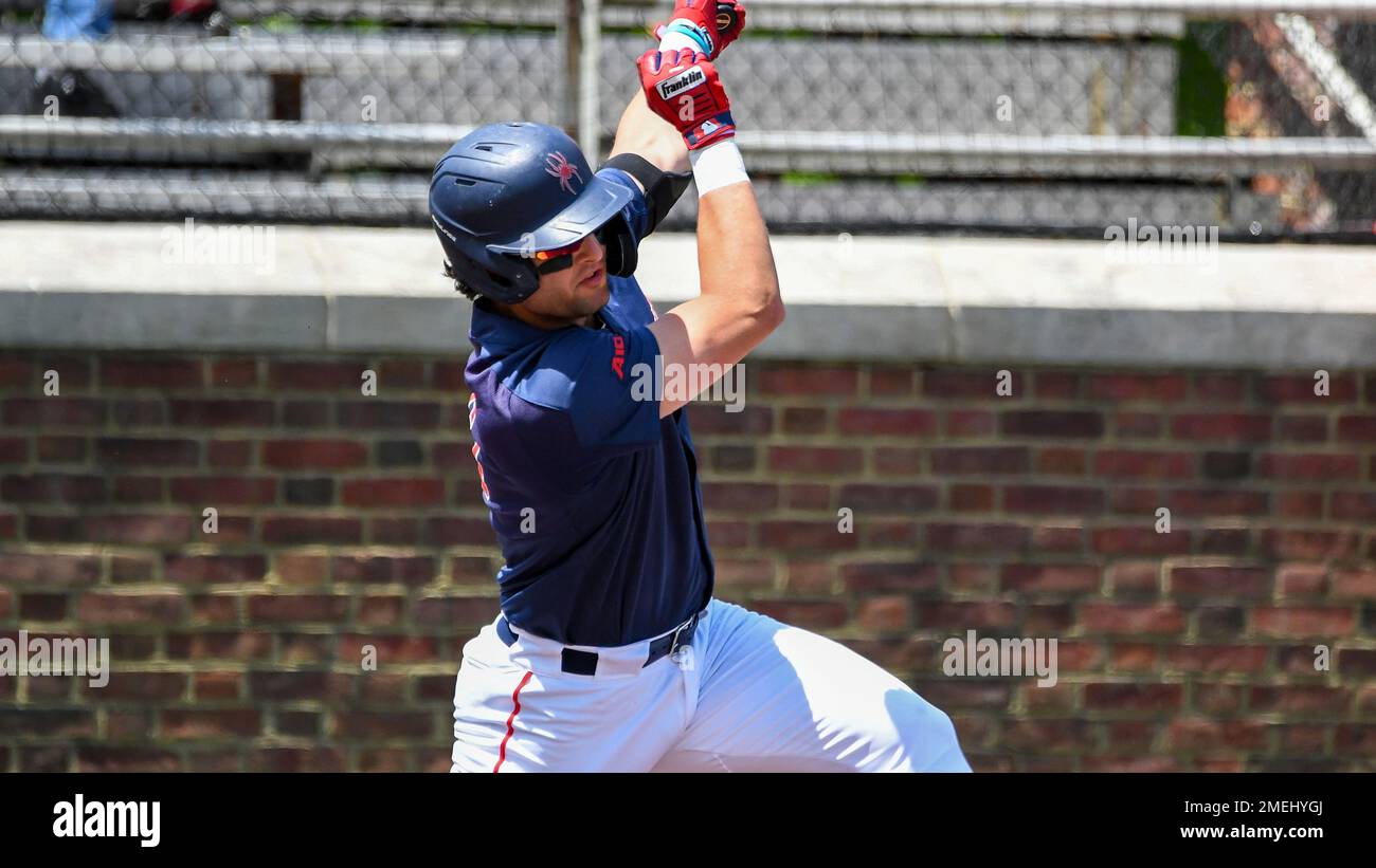 Richmond's Dominic Toso swings and misses during an NCAA baseball game ...