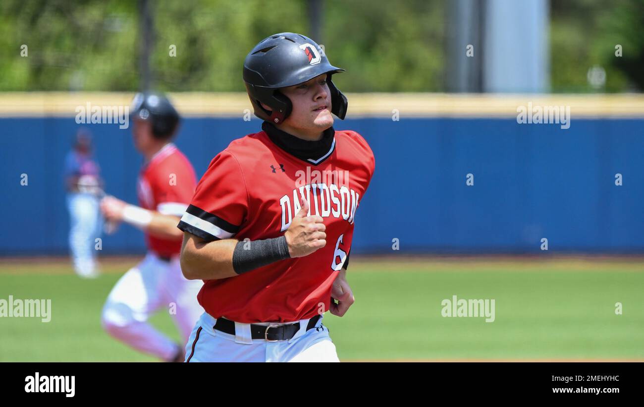 Davidson's Garrett Browder rounds third base and heads for home during ...