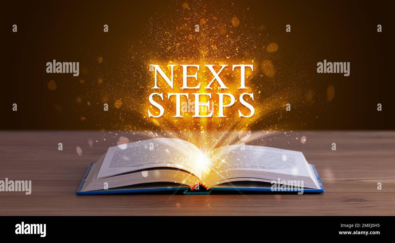 Educational inscription coming out from an open book Stock Photo - Alamy