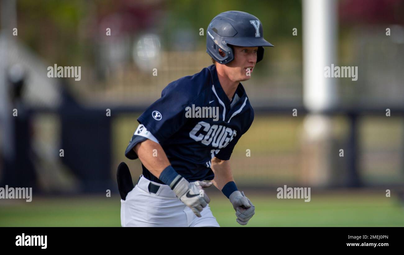BYU catcher Joshua Cowden (17) looks to steal a base during an NCAA ...