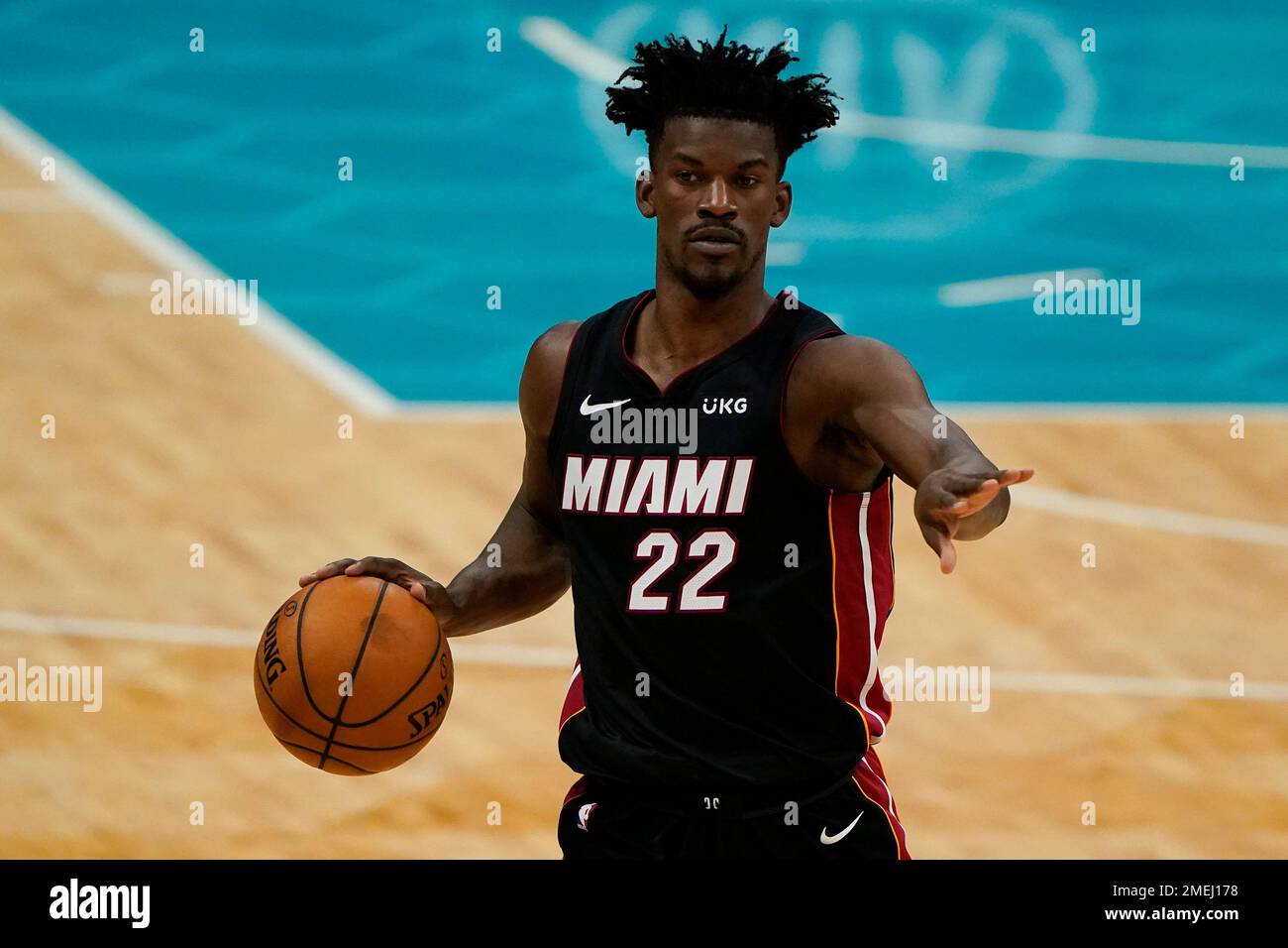Miami Heat forward Jimmy Butler brings the ball down court against the ...
