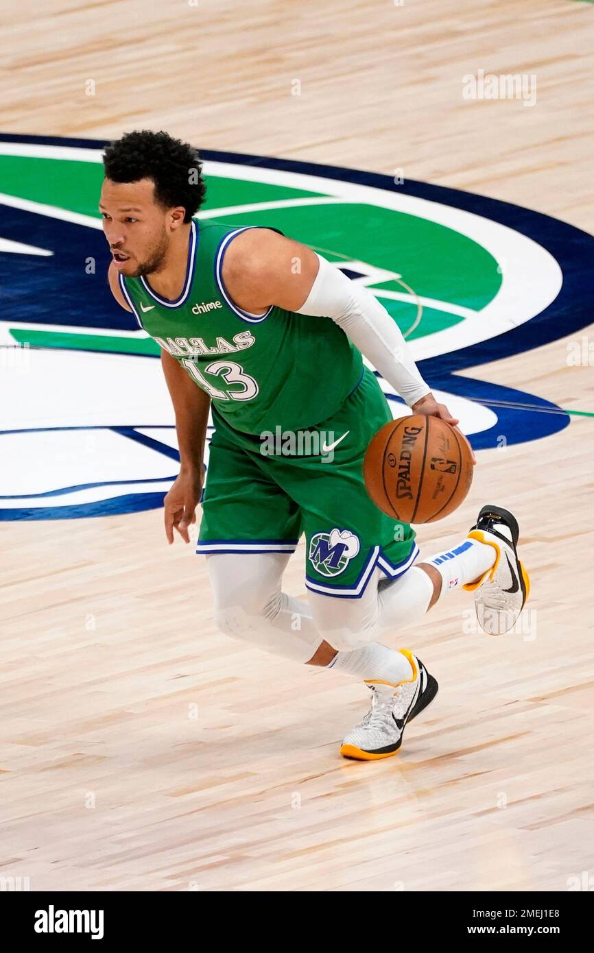 Dallas Mavericks guard Jalen Brunson handles the ball during an NBA ...
