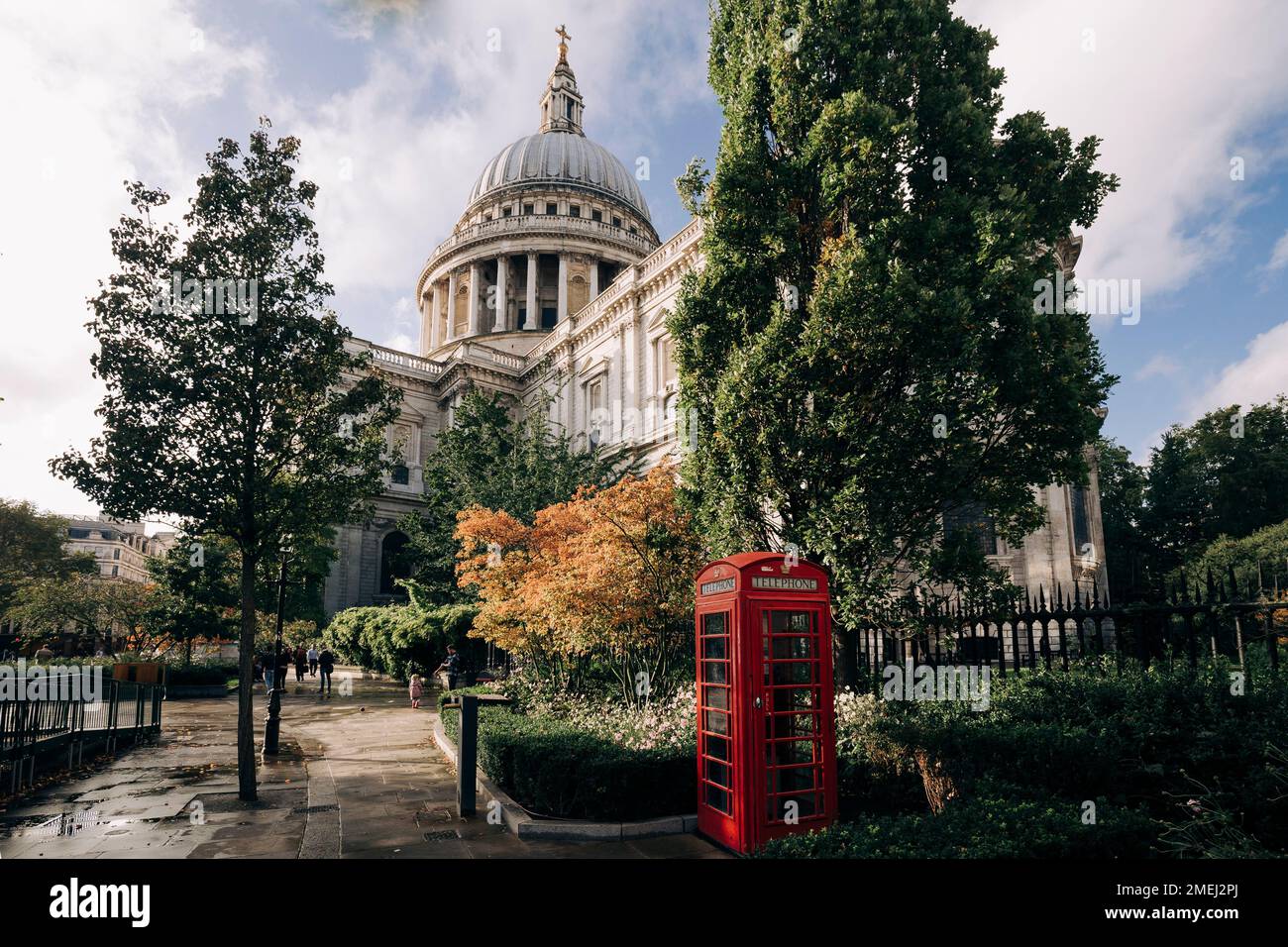 A scenic shot of St Paul's Cathedral and a red telephone booth in ...
