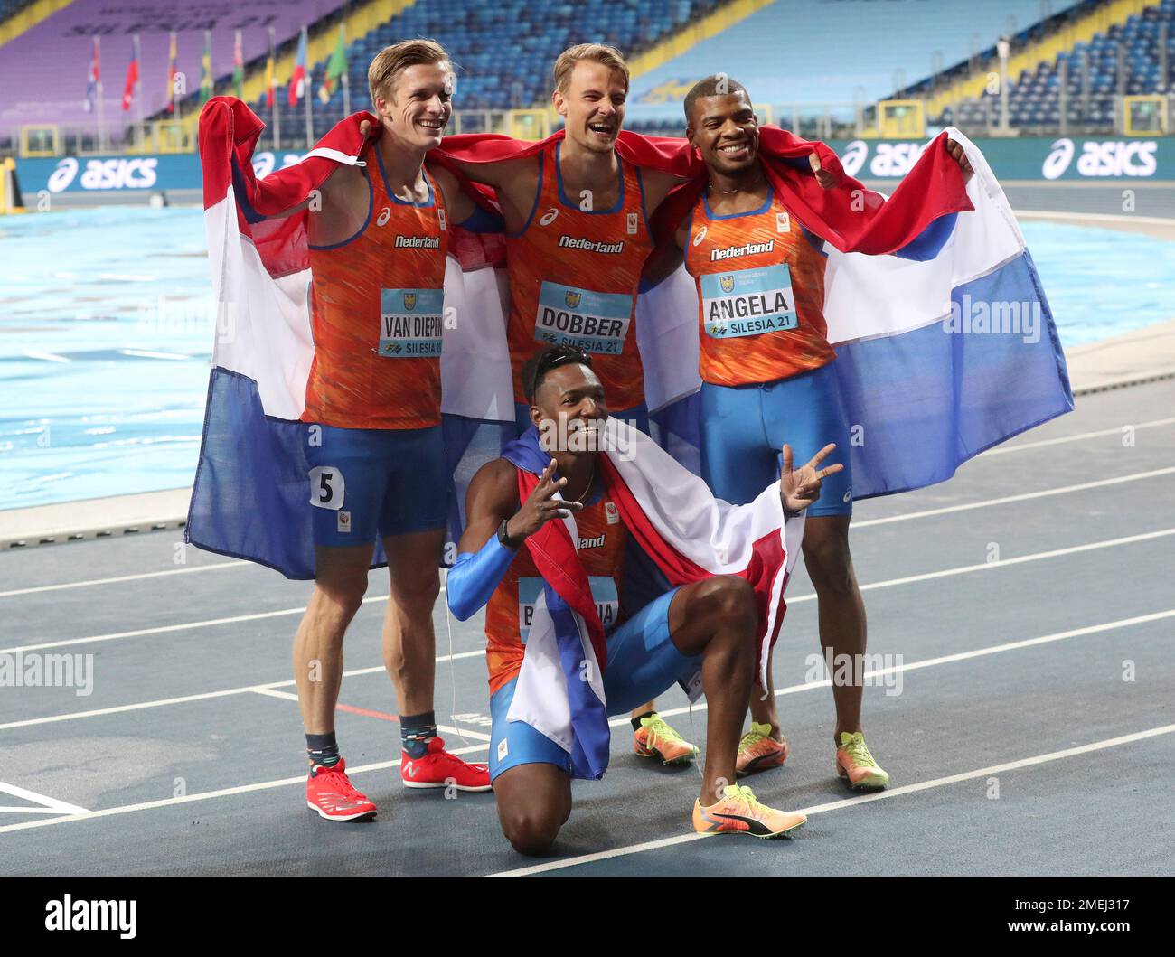 Members of the Dutch relay team celebrate after competing in the men's ...