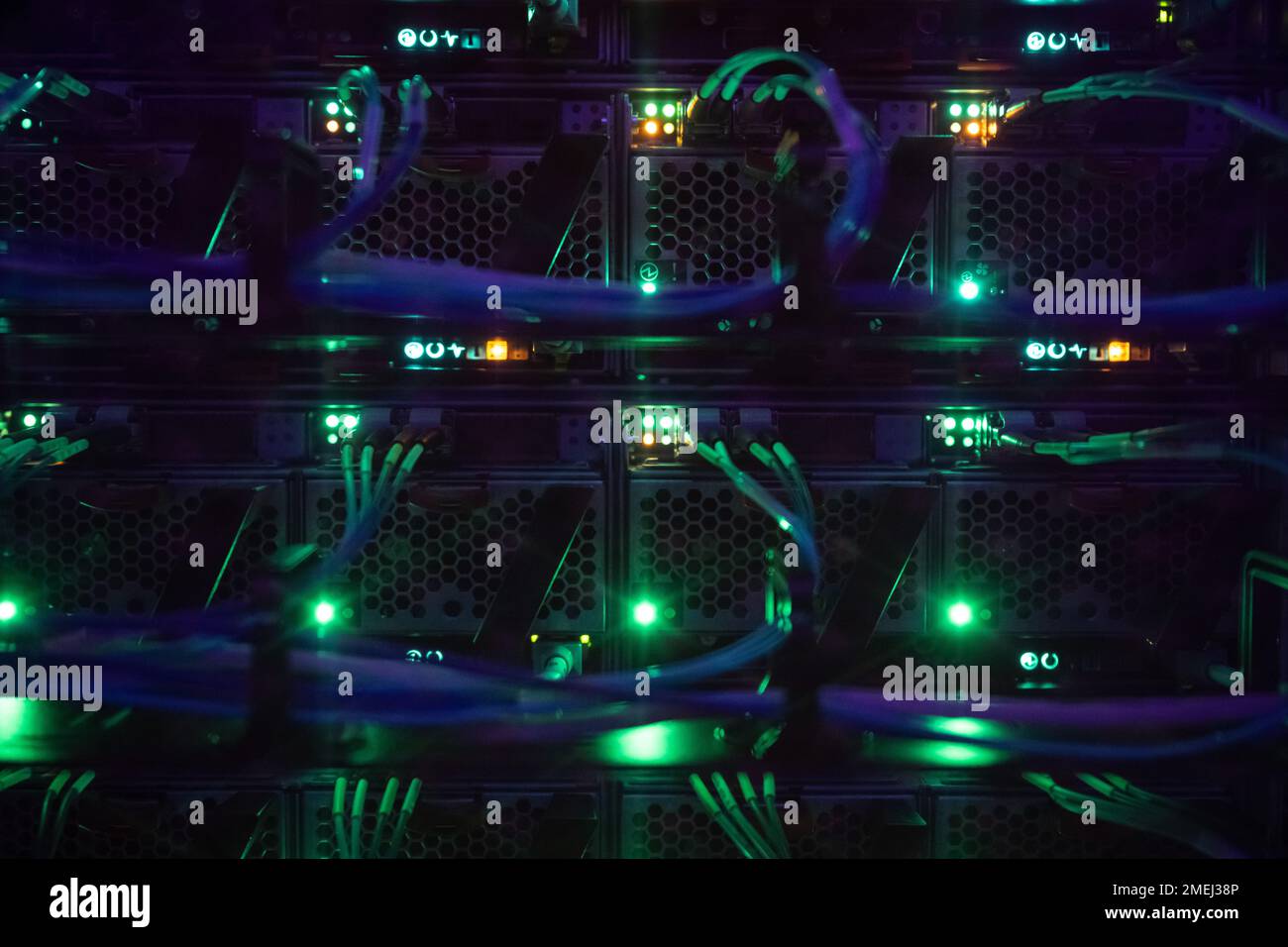 23 January 2023, Hessen, Frankfurt/Main: LEDs light up in a server rack ...
