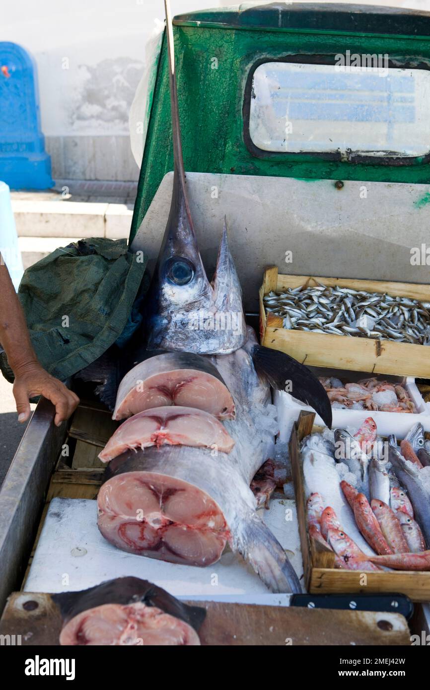Porticello fishing port, Today's catch a swordfish is sold from the ...