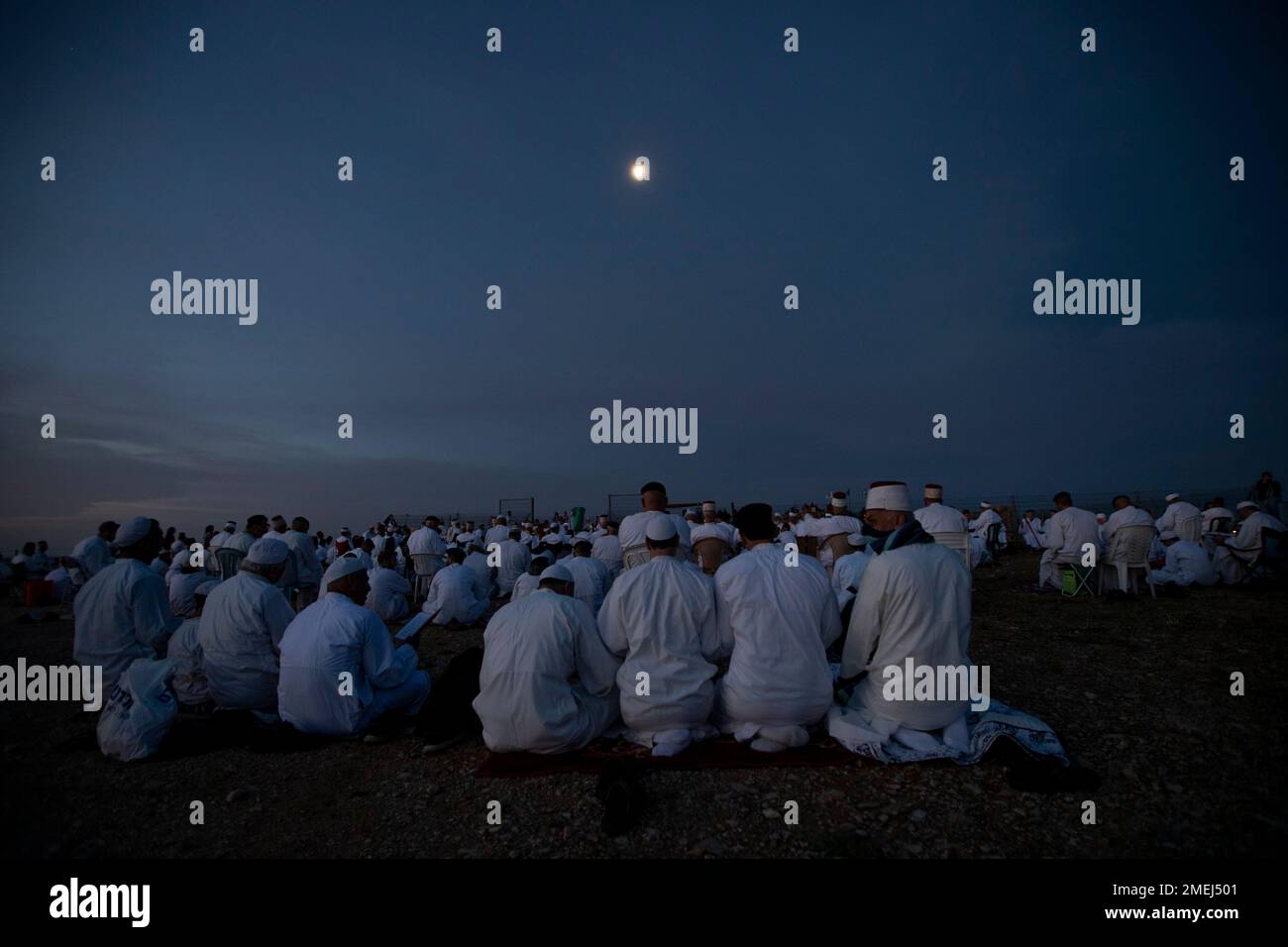 Members of the ancient Samaritan community pray during the Passover ...