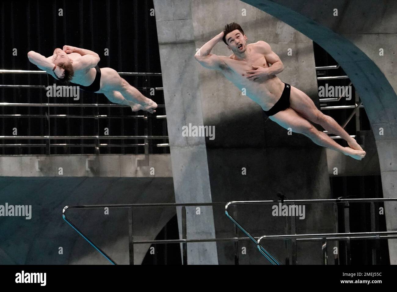 Daniel Goodfellow and Jack Laugher of Britain perform a dive during the ...