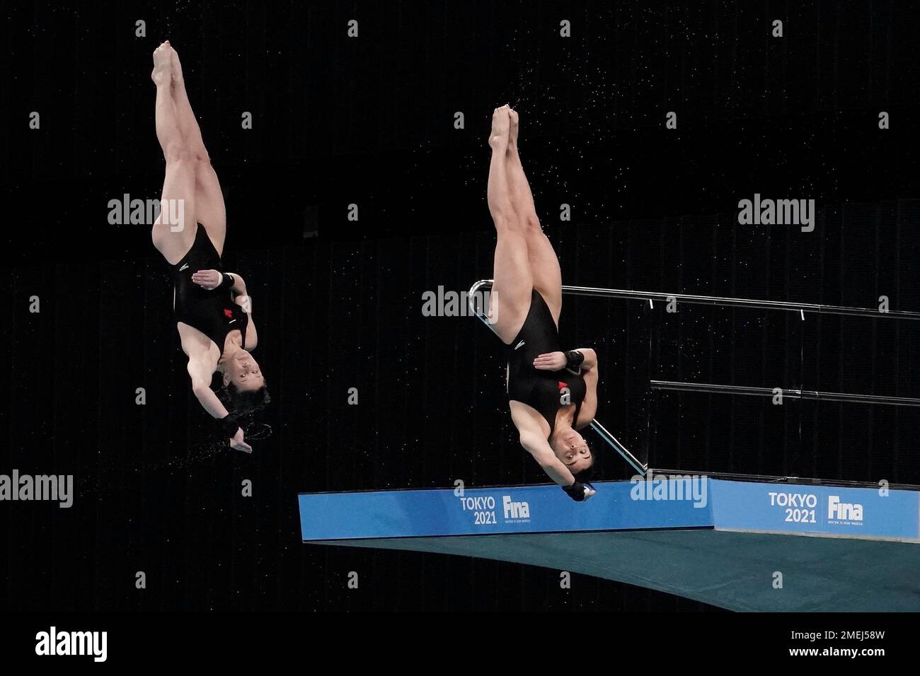 Canada's Meaghan Benefeito and Caeli McKay perform a dive during the ...