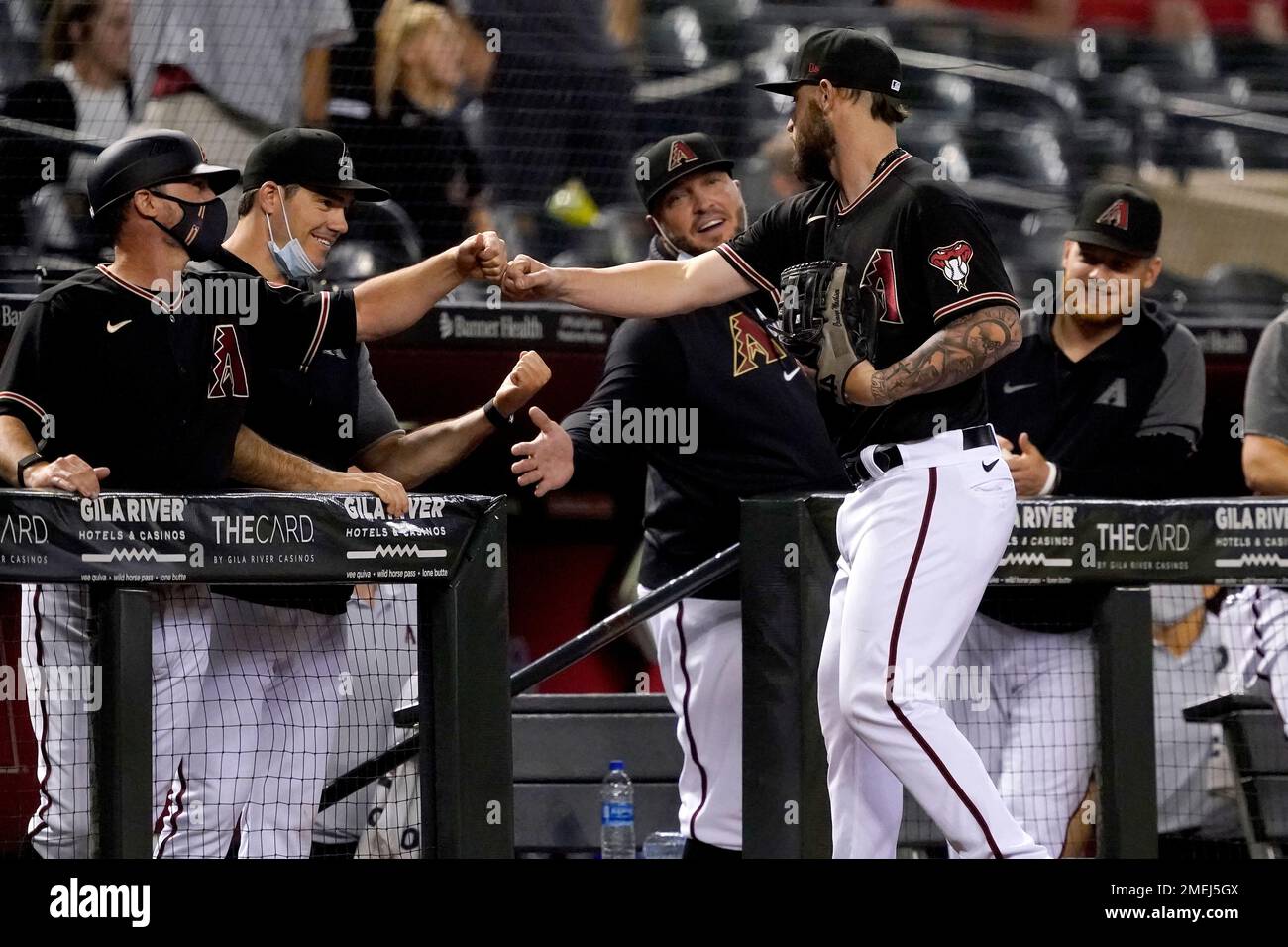 Arizona Diamondbacks position player Wyatt Mathisen, right, greets his ...