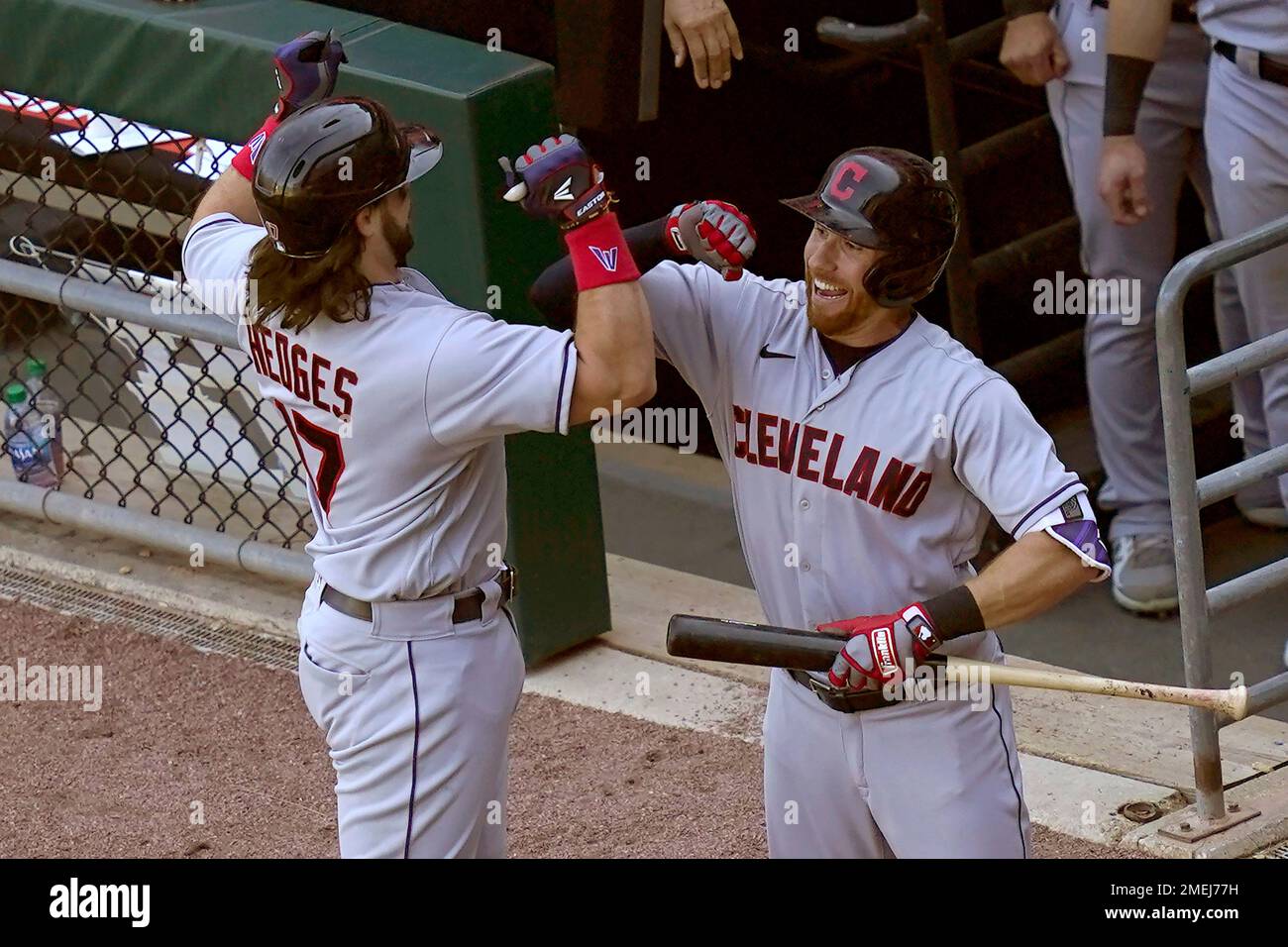 Cleveland Indians' Austin Hedges (17) celebrates his home run with Jake ...