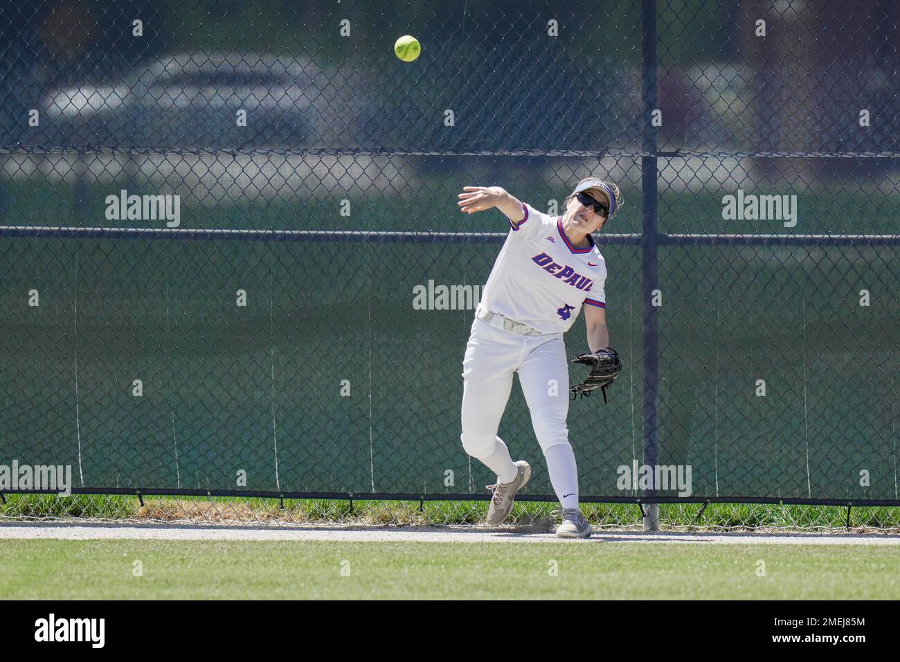 DePaul outfielder Kate Polucha (4) in action during an NCAA softball ...