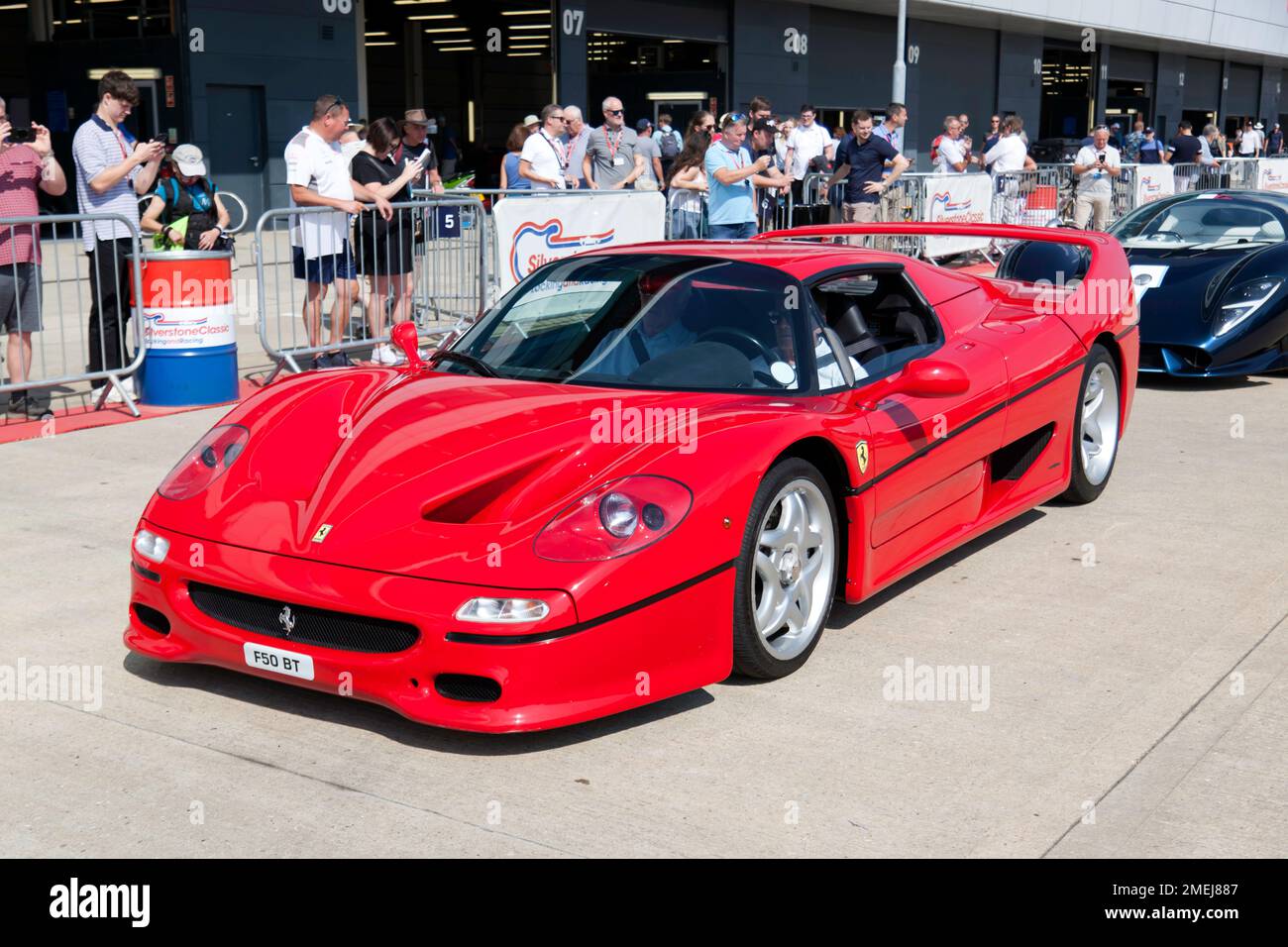 Three-quarters Front View of a red Ferrari F50,preparing for the ...