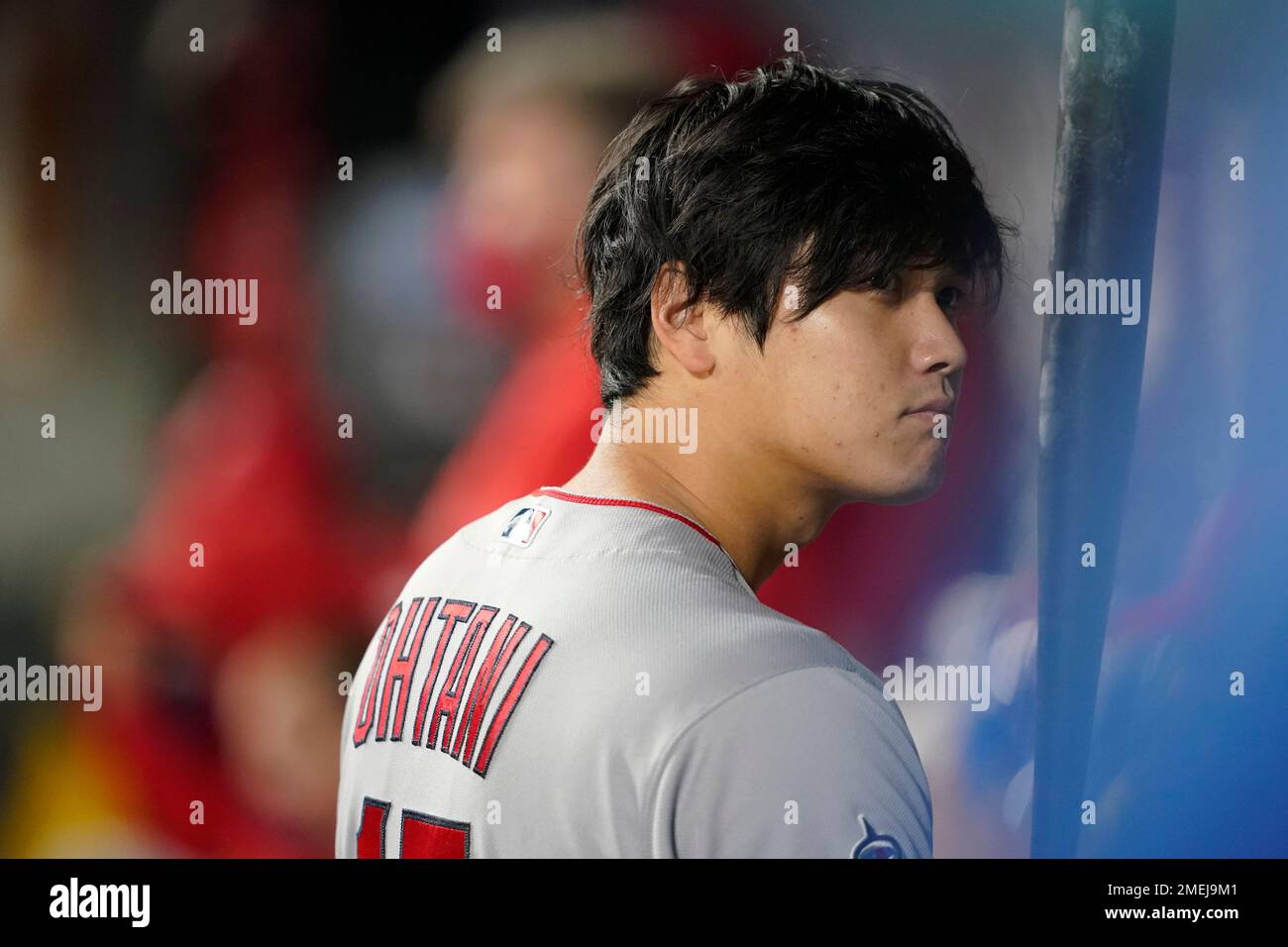 Los Angeles Angels' Shohei Ohtani holds his bat in the dugout during a ...