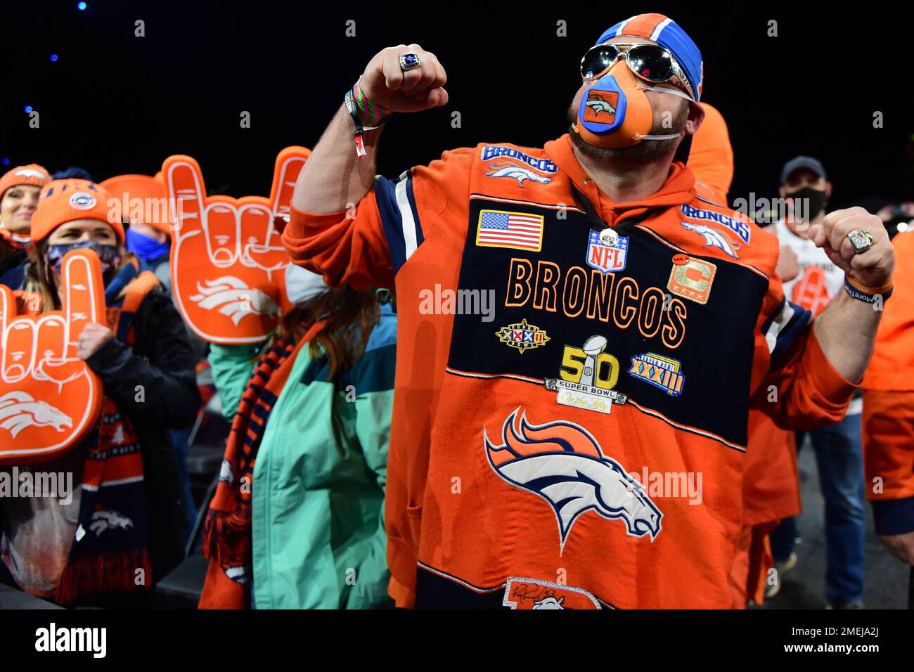 Denver Broncos fans react during the third round of the NFL football ...