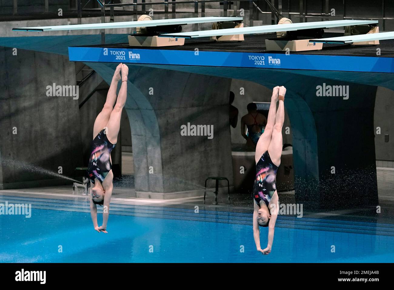 Chang Yani and Chen Yiwen of China dive during the women's synchronized ...