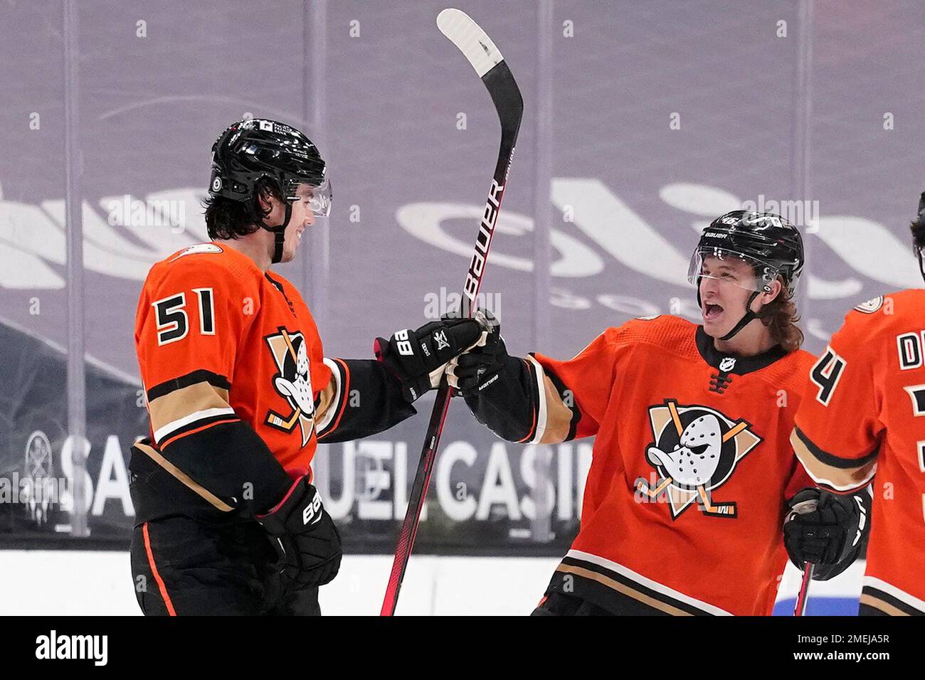 Anaheim Ducks defenseman Haydn Fleury, left, celebrates his goal with ...