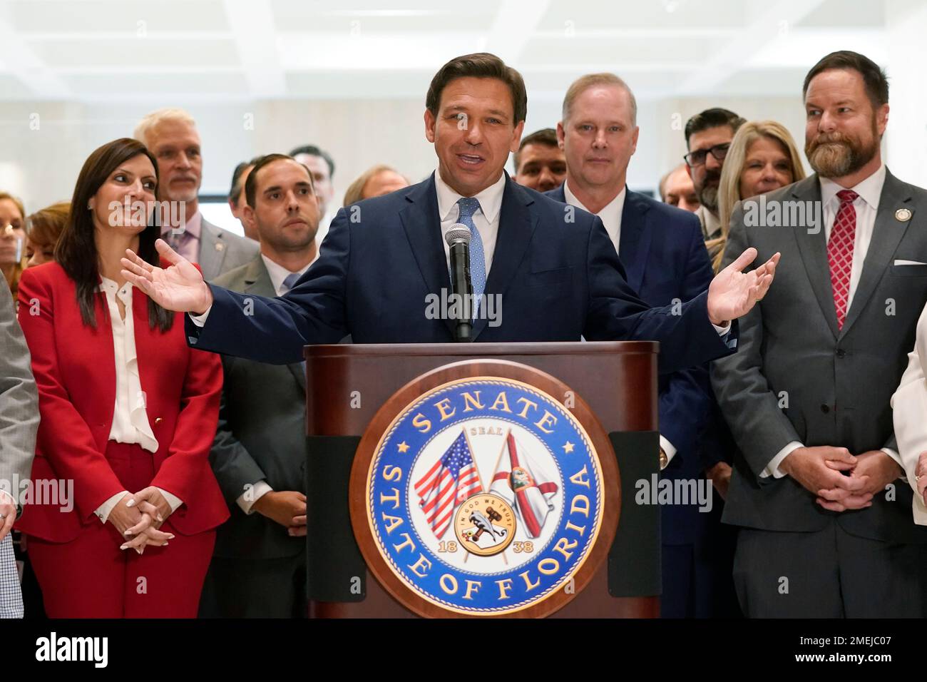 Surrounded by lawmakers, Florida Gov.Ron DeSantis speaks at the end of ...