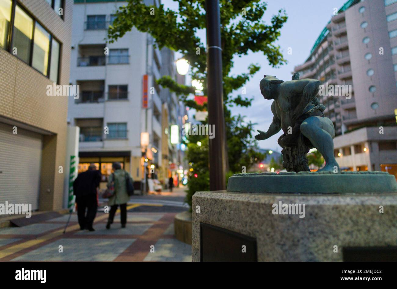 A statue of a sumo wrestler near the Ryogoku Kokugikan sporting arena ...