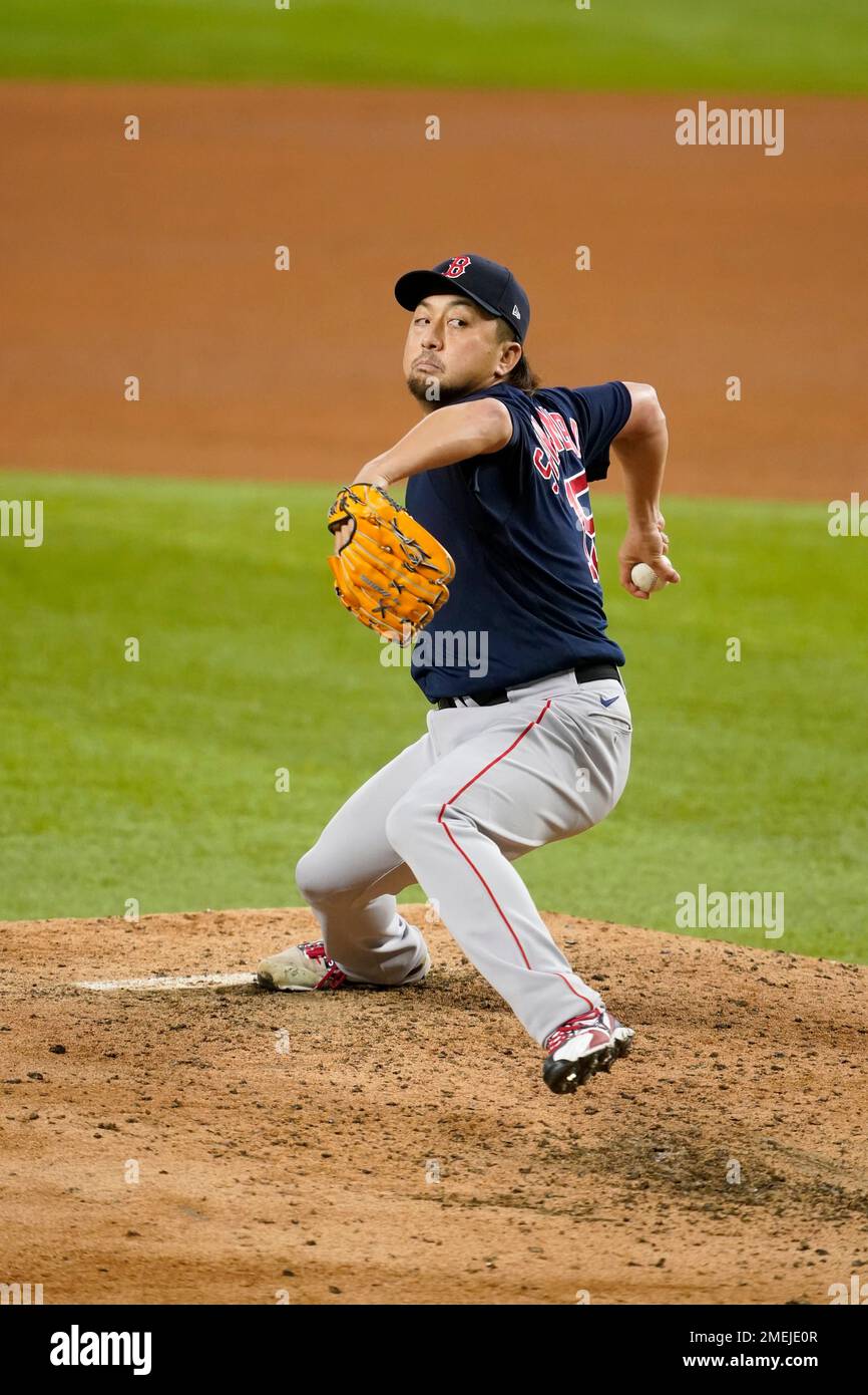 Boston Red Sox's Hirokazu Sawamura works against the Texas Rangers in a ...