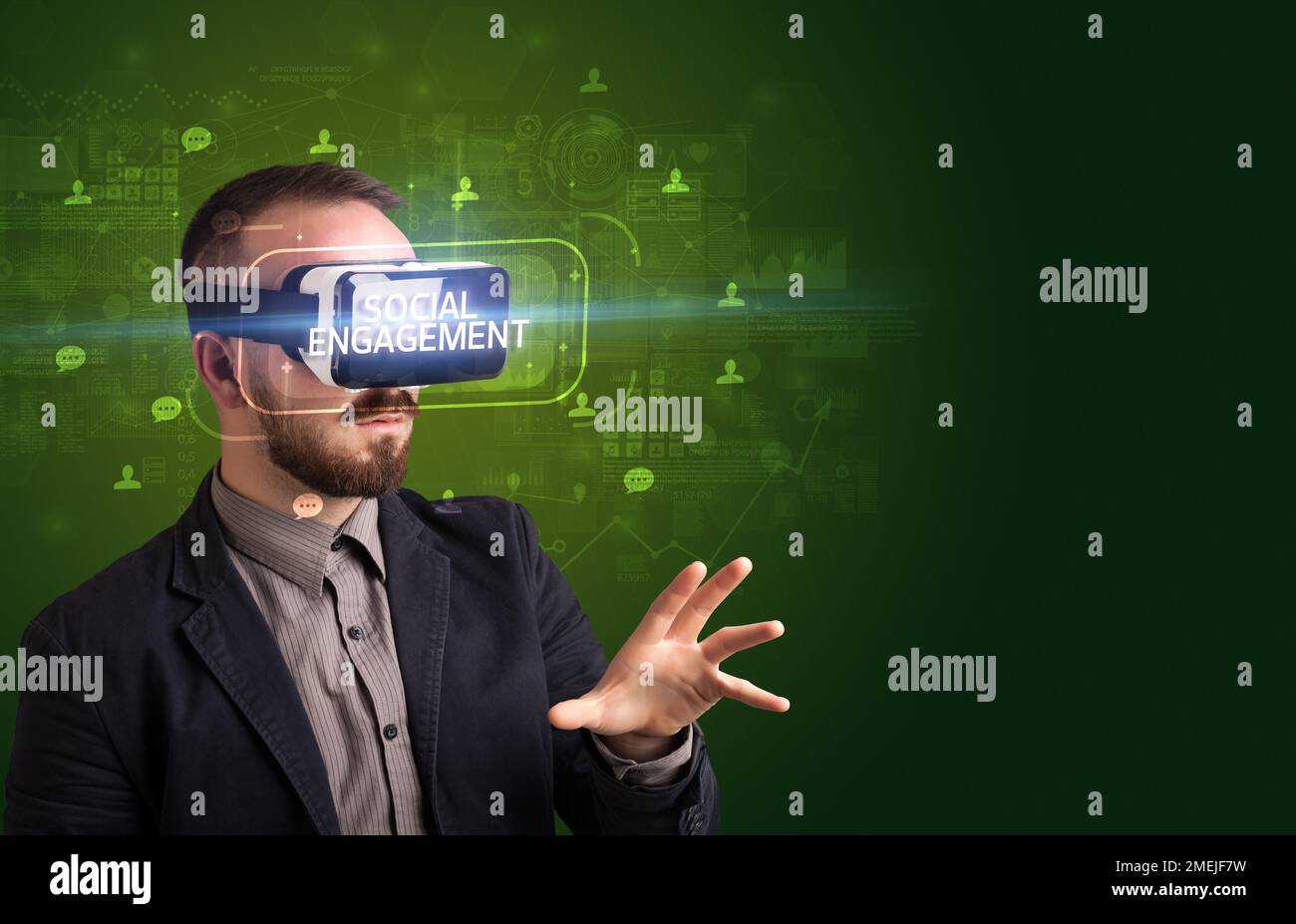 Businessman looking through Virtual Reality glasses, social media ...