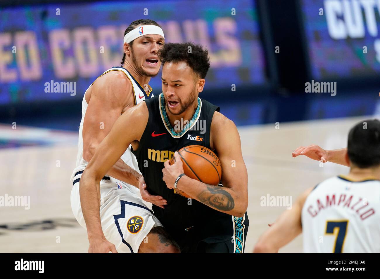 Memphis Grizzlies forward Kyle Anderson (1) and Denver Nuggets forward ...