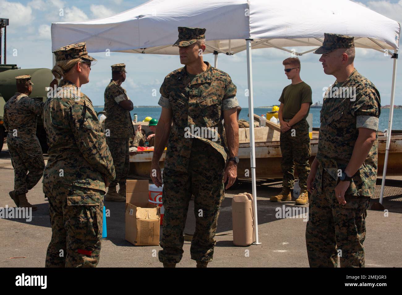 U.S. Marine Corps Staff Sgt. Lacy Rundell, left, landing support ...