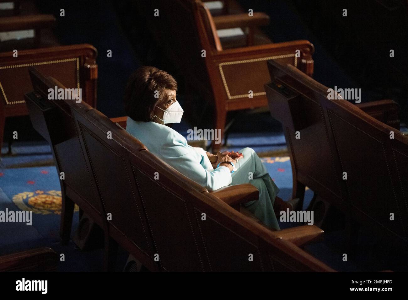 Rep. Maxine Waters, D-Calif., waits in her seat before President Joe ...