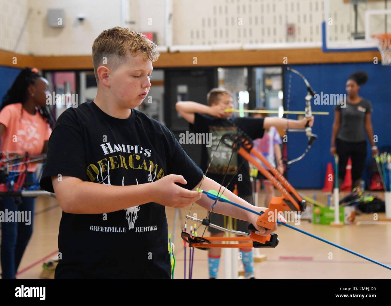 Everett Cole prepares his bow to fire an arrow at a target during the ...