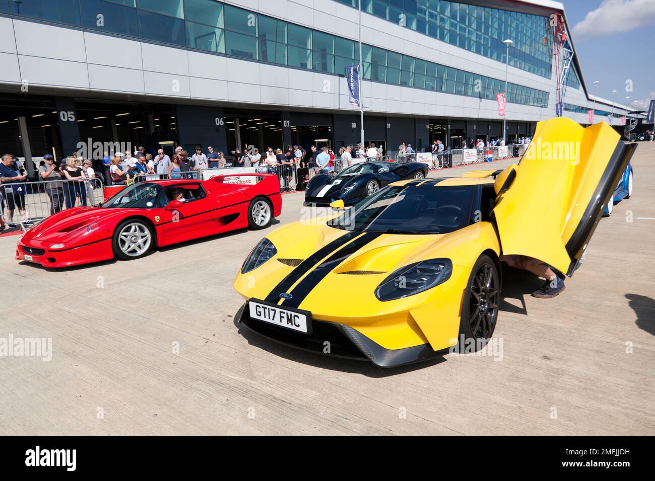 Supercars lined up in front of the Wing, preparing for the Yokohama ...