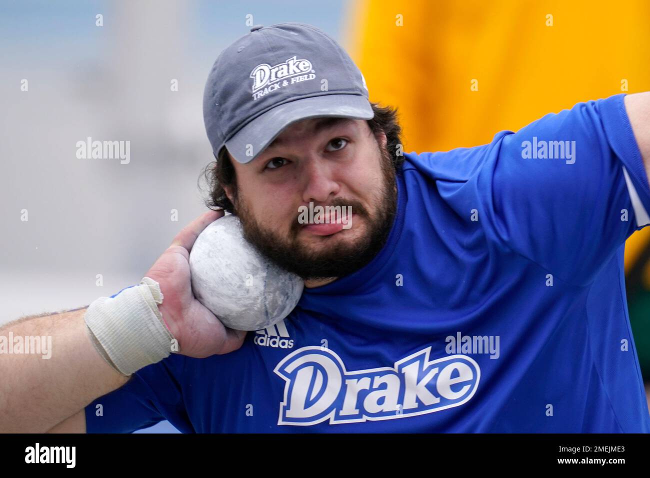 Drake's Adam Kessler throws during the university men's shot put at the ...