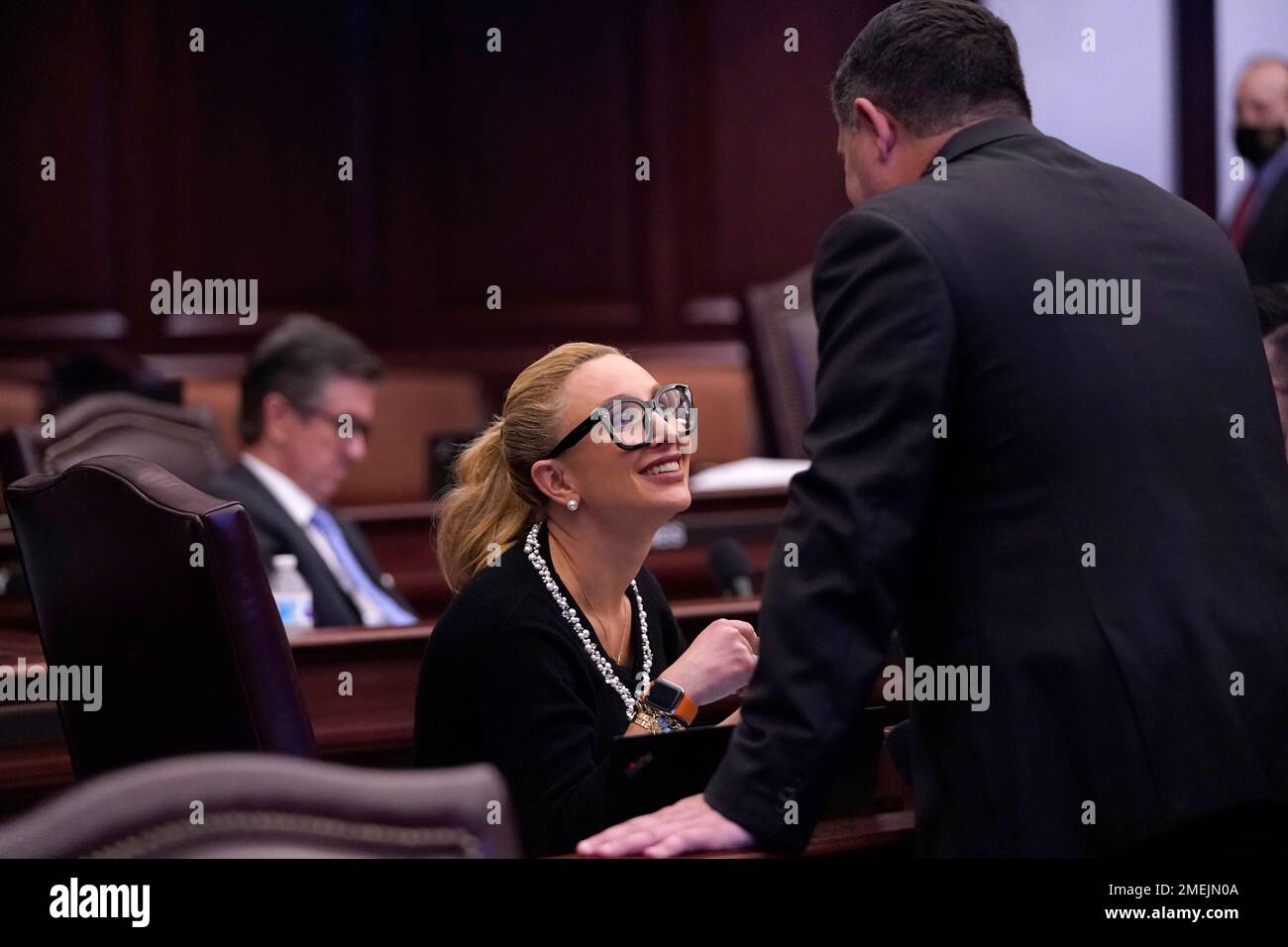 Florida Senators Lauren Book, left, and Travis Hutson chat during a ...