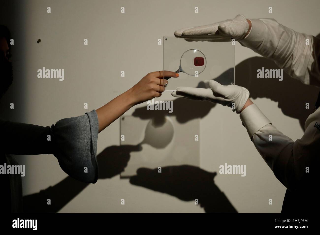 A British Guiana One-Cent Magenta stamp is photographed at premises of ...
