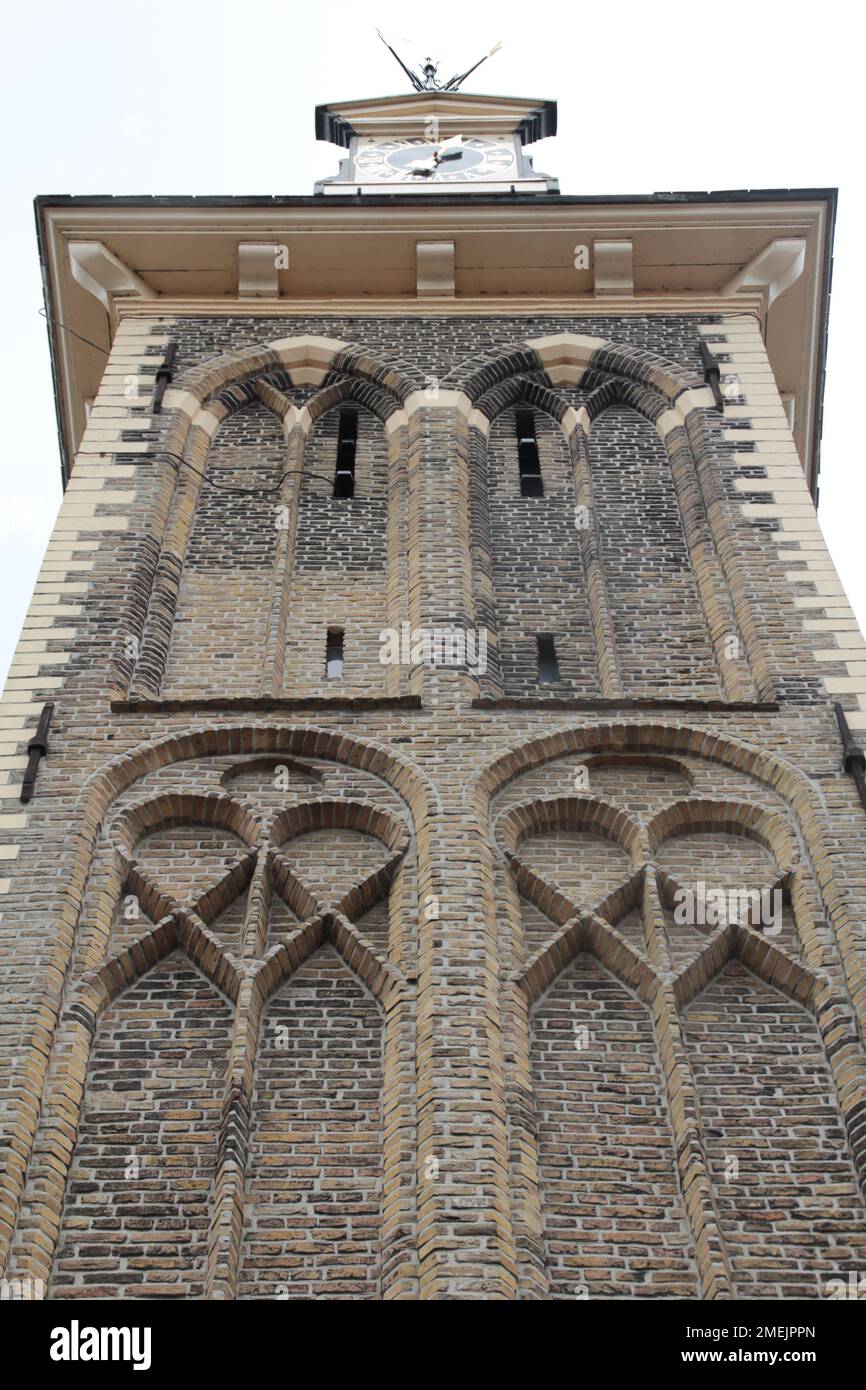 A low angle view of the St. Barbara tower in Gouda, Netherlands Stock ...