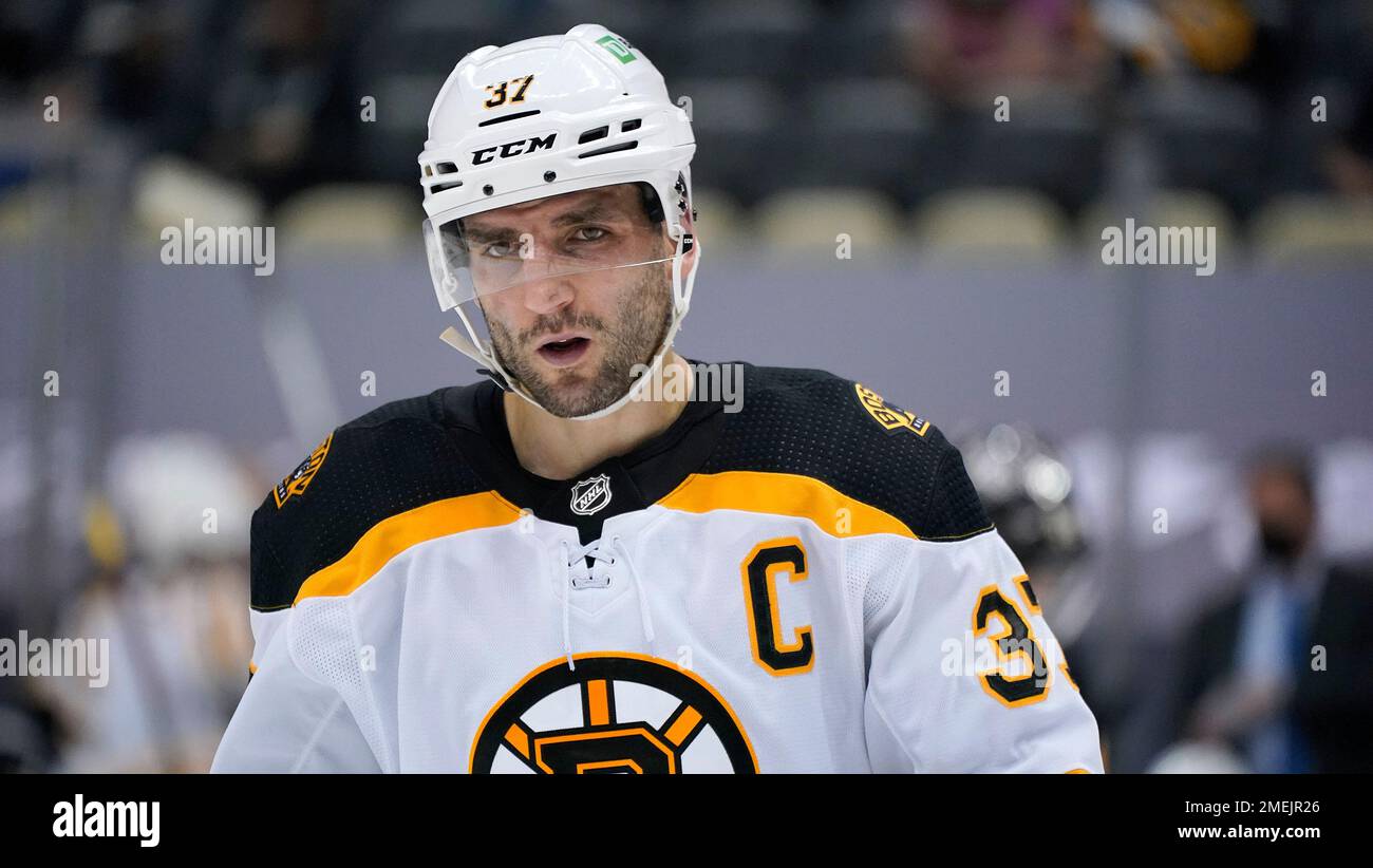 Boston Bruins' Patrice Bergeron prepares for a face-off during an NHL ...