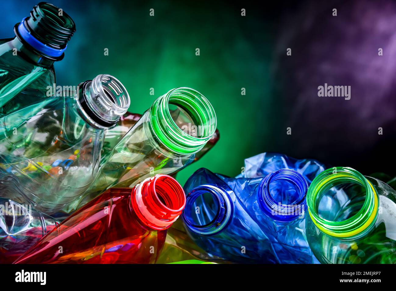 Empty colored drink bottles. Recyclable plastic waste Stock Photo - Alamy