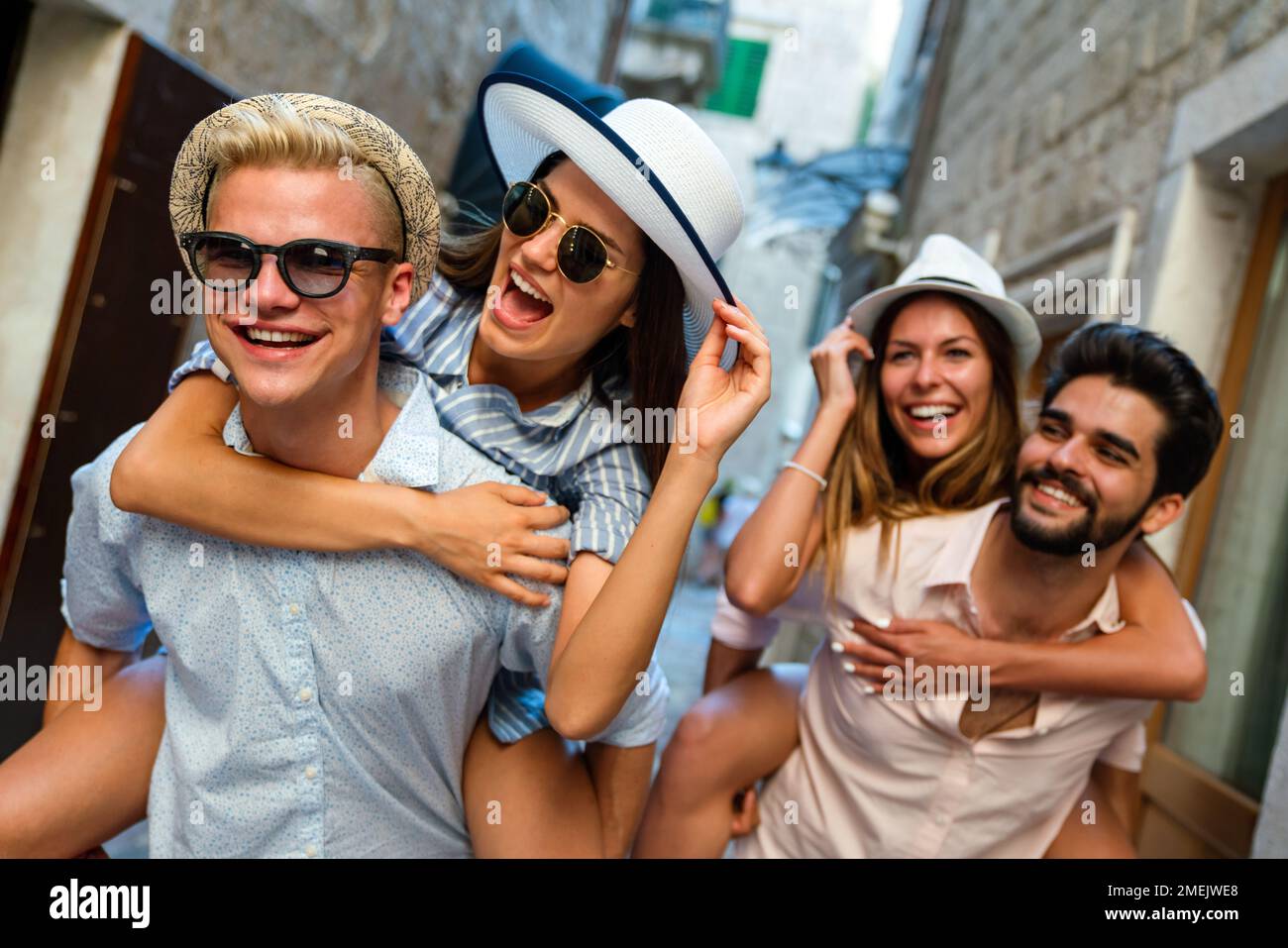 Happy group of young friends enjoying travel and summer vacation ...