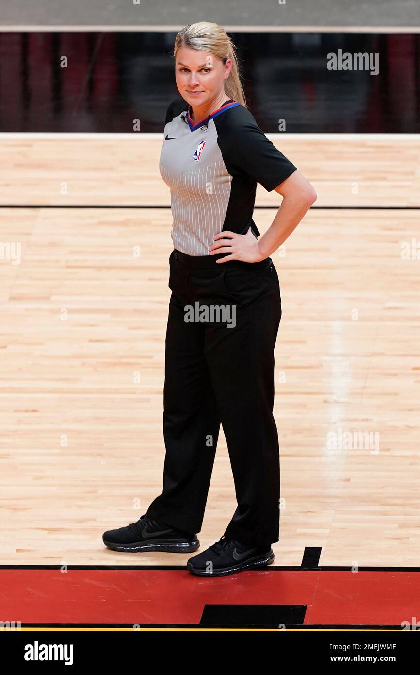 NBA referee Jenna Schroeder (84) stands on the court during the first ...
